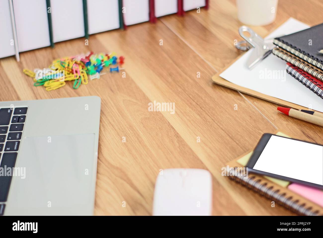 Workspace with mobile phone and office equipments on wood desk work ...