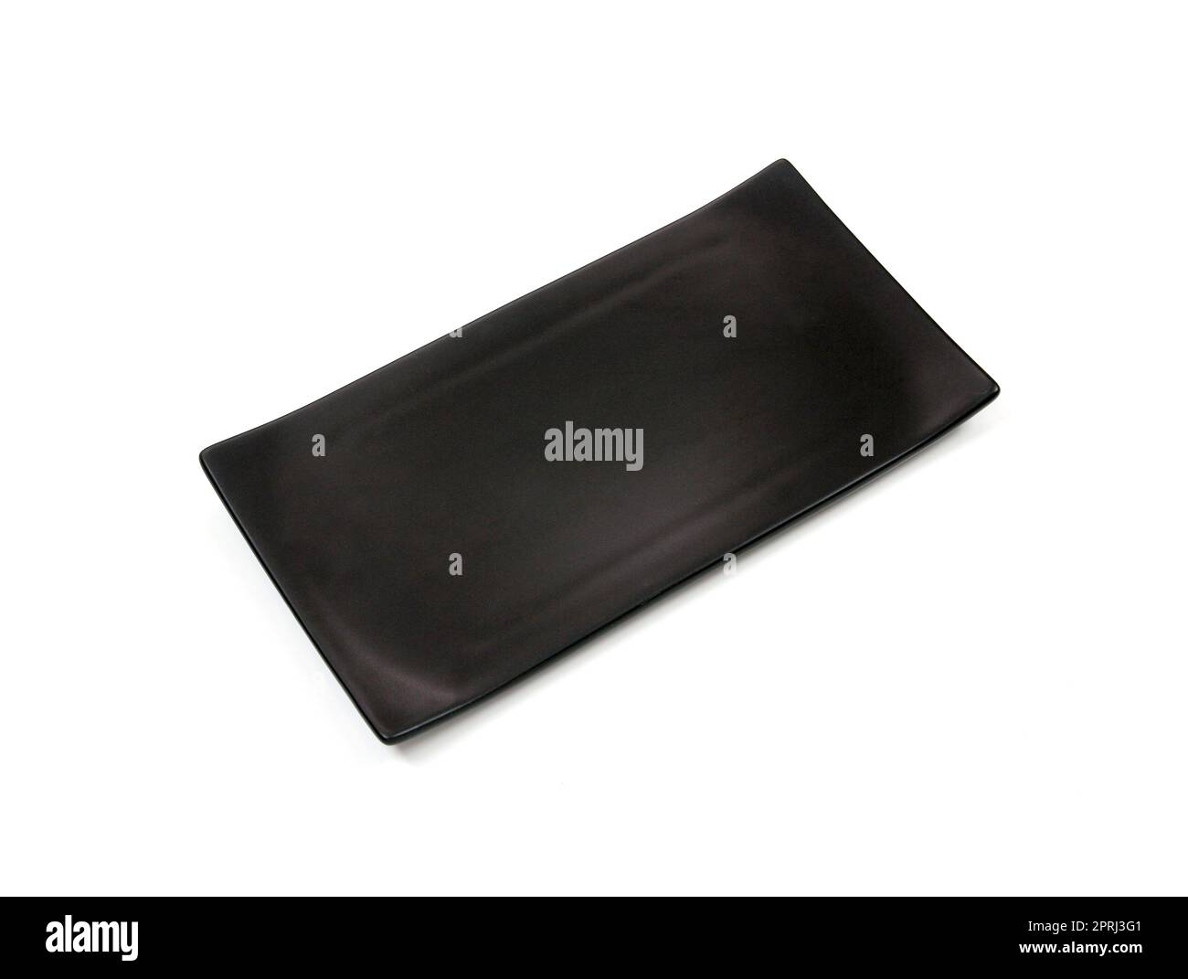 Empty black rectangle ceramic plate with rough texture, isolated on ...