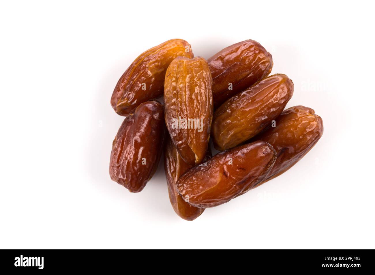 Date fruit close up isolated on white background Stock Photo - Alamy