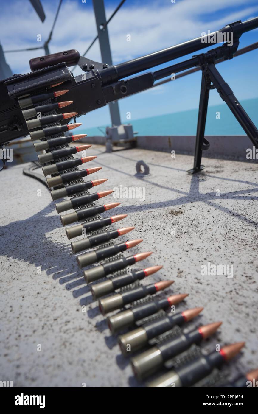 Machine gun belt loaded with cartridges Stock Photo - Alamy