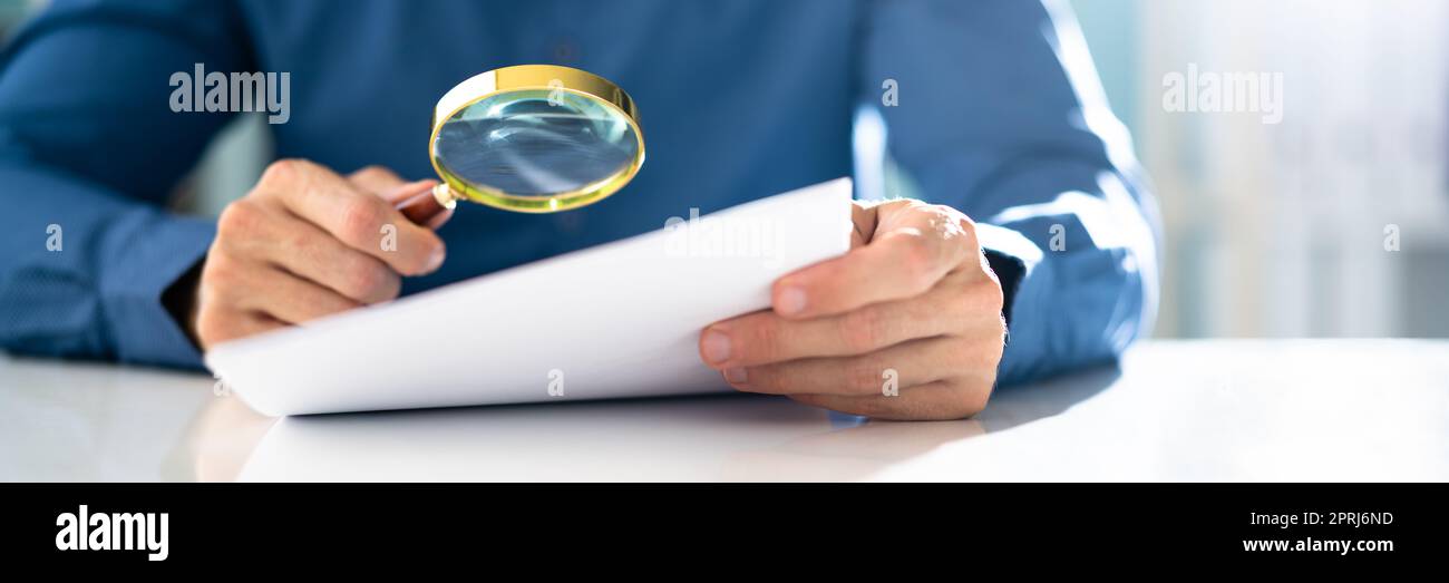 Audit Accountant Using Magnifier Glass Stock Photo - Alamy