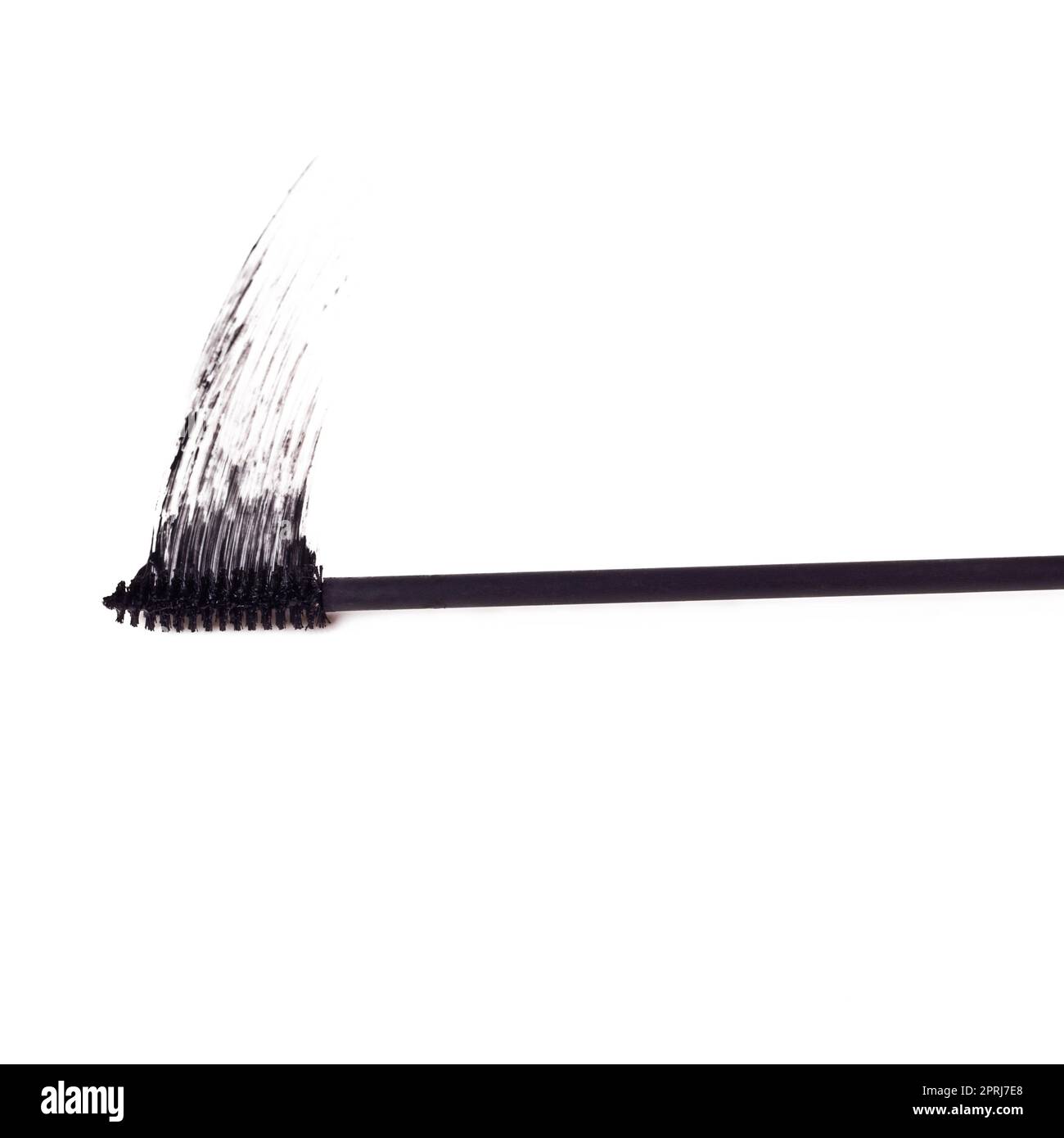 Black is the new black. Studio shot of a mascara brush smearing makeup ...