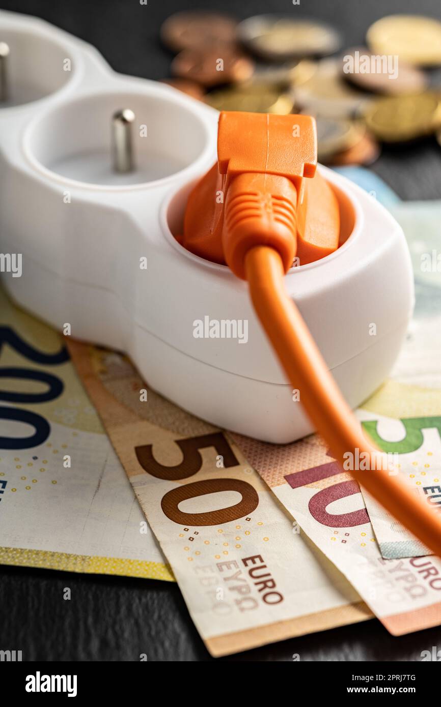 Electric plug, socket and euro money. Concept of increasing electric ...