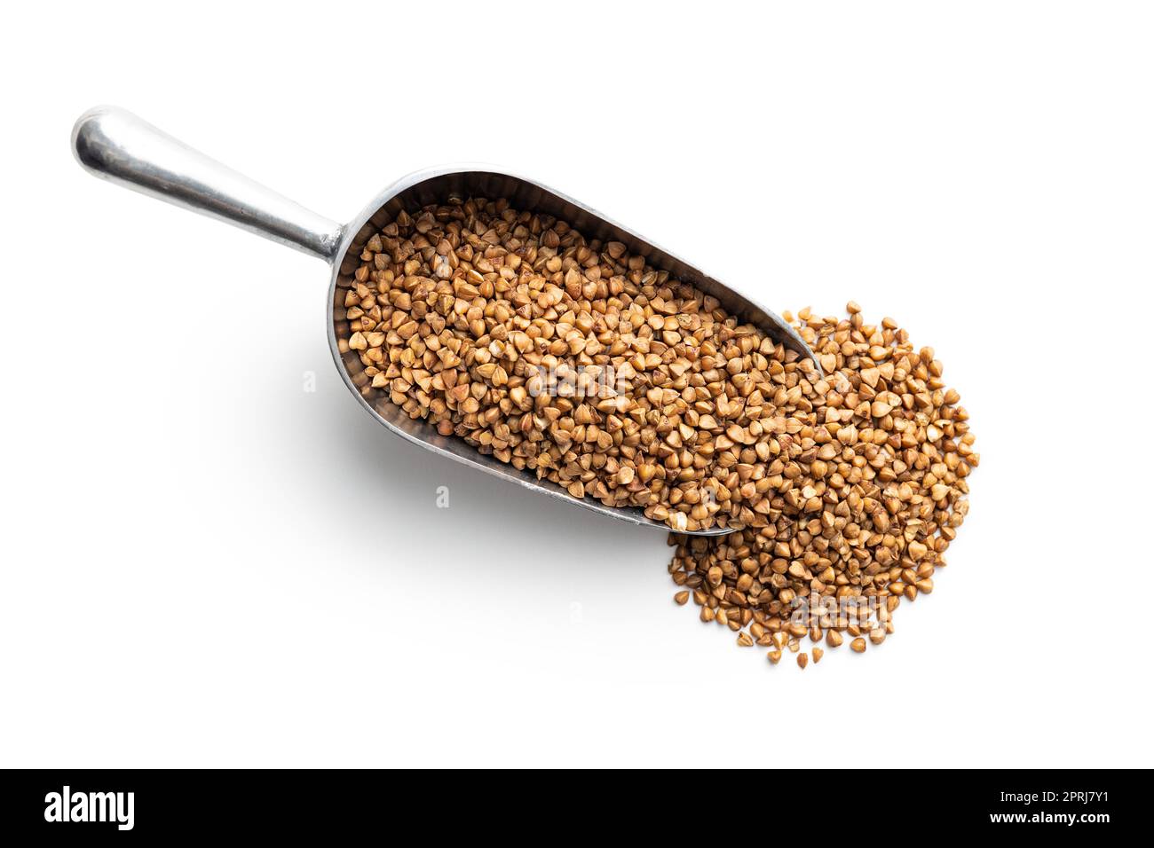 Uncooked buckwheat grain in scoop isolated on white background Stock ...