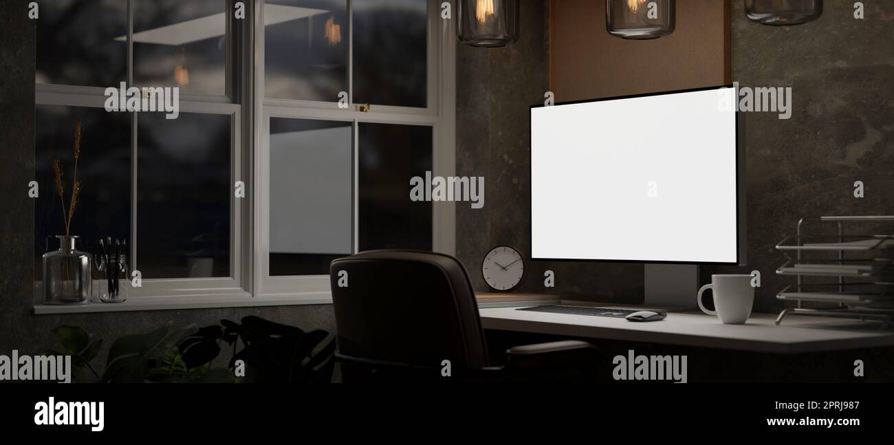 Modern home office at night with PC computer blank screen mockup on a ...