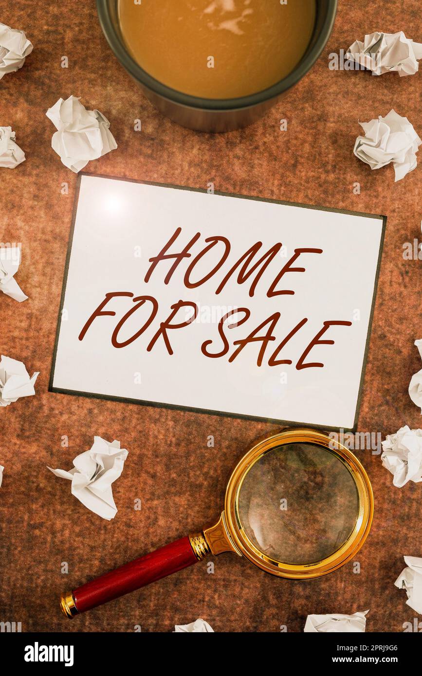 Sign displaying Home For Sale. Internet Concept House available to be ...