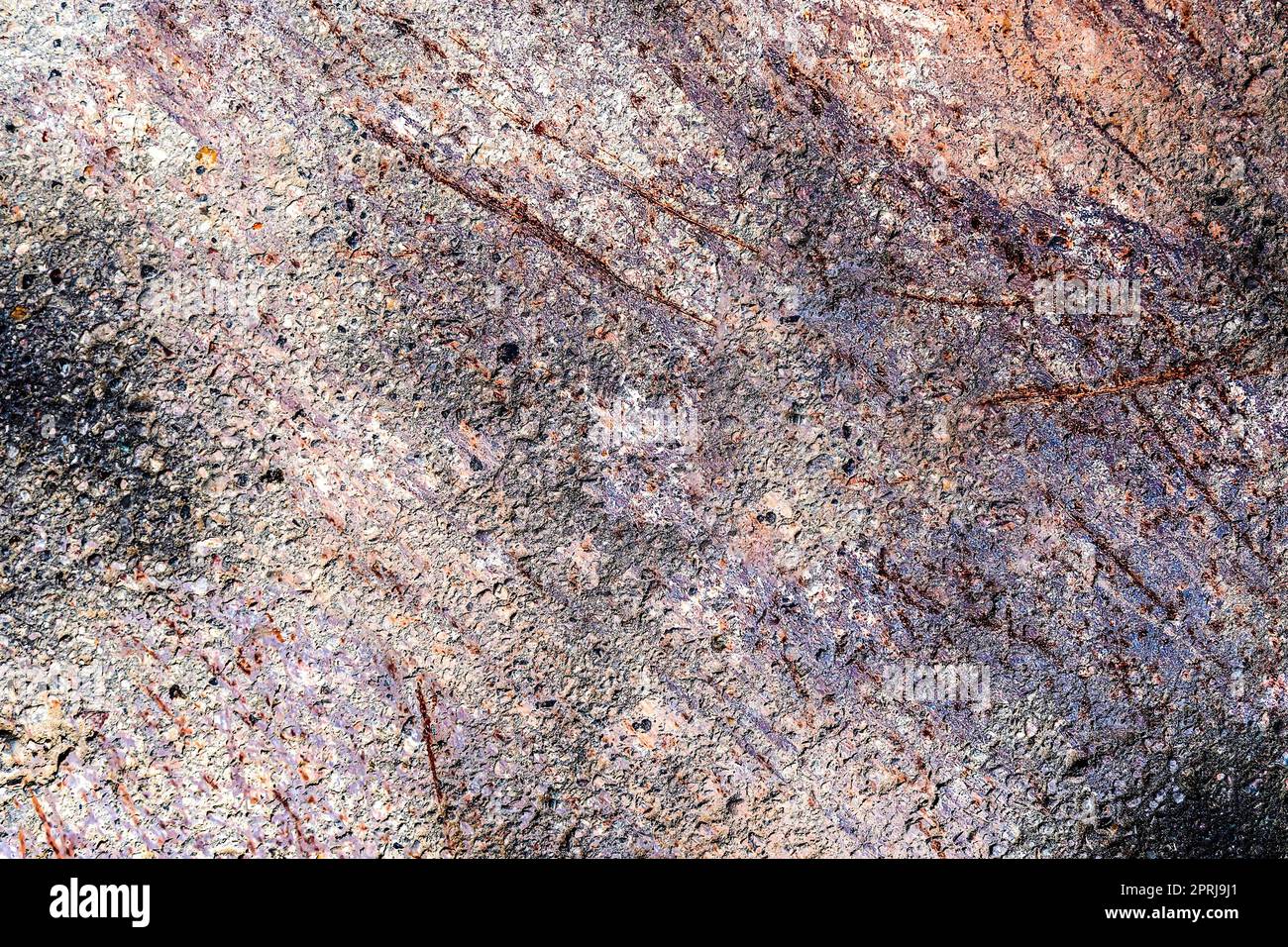 Detailed close up surface of rusty metal and stone with lots of ...