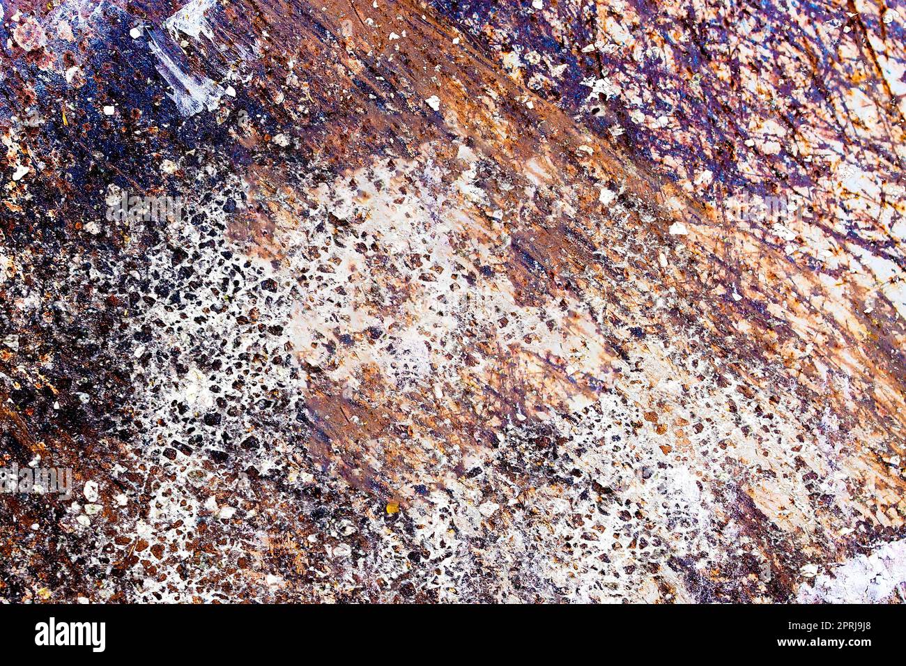 Detailed close up surface of rusty metal and stone with lots of ...