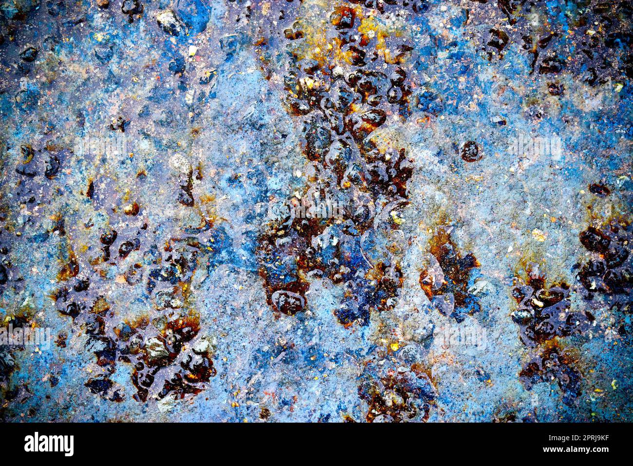 Detailed close up surface of rusty metal and stone with lots of ...