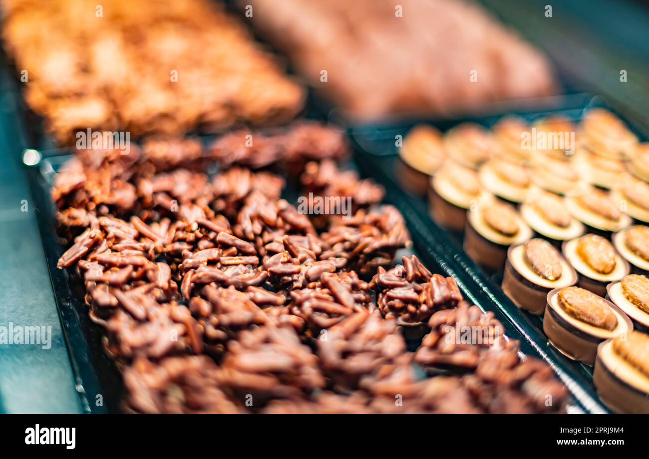Chocolate pralines displayed in a confectionery store Stock Photo - Alamy