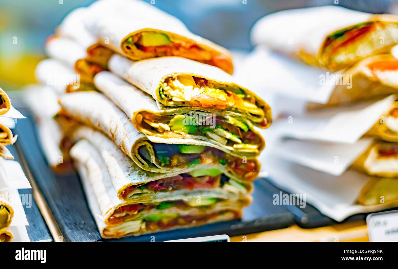 Freshly prepared tortilla wraps sold in a fast food restaurant Stock ...