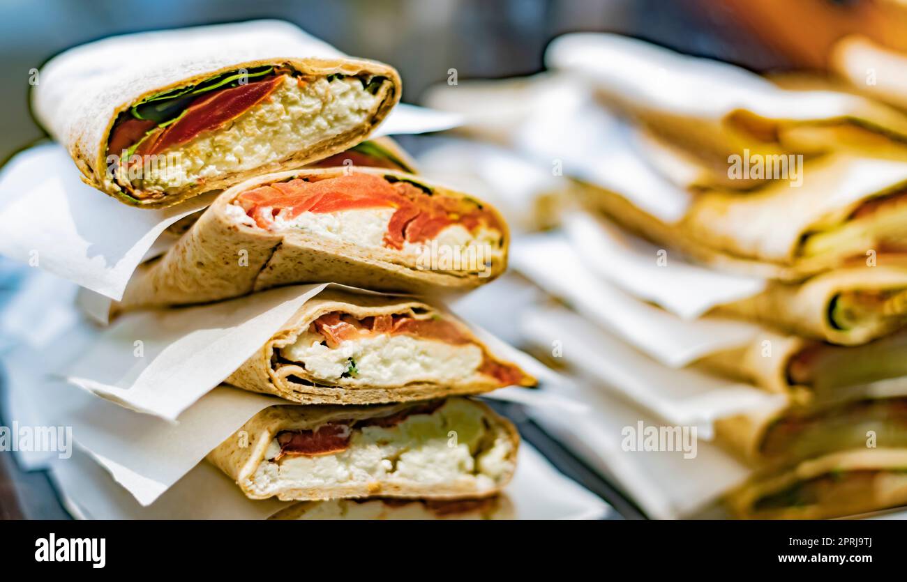 Freshly prepared tortilla wraps sold in a fast food restaurant Stock ...