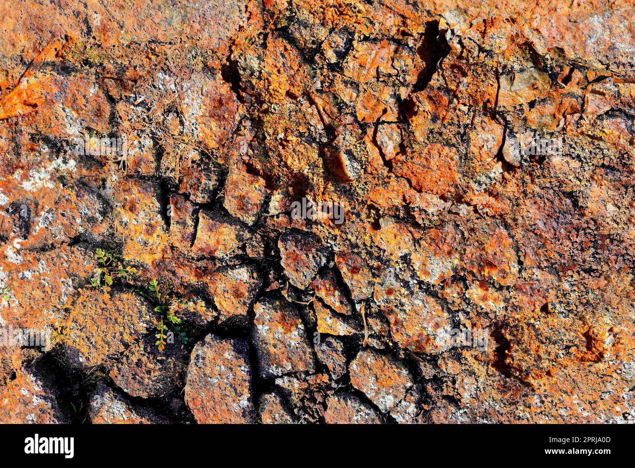 Detailed close up surface of rusty metal and stone with lots of ...