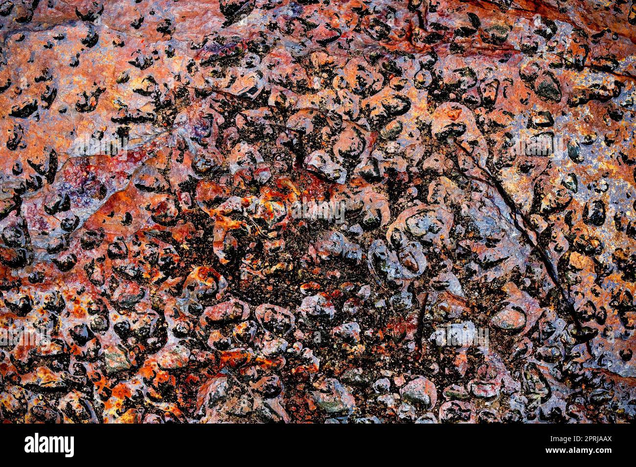 Detailed close up surface of rusty metal and stone with lots of ...