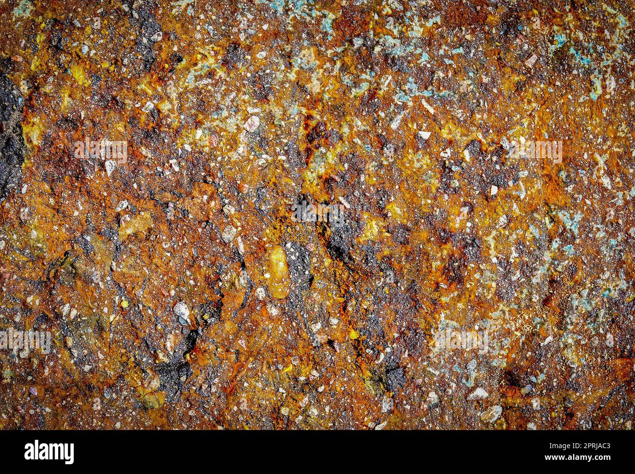 Detailed close up surface of rusty metal and stone with lots of ...