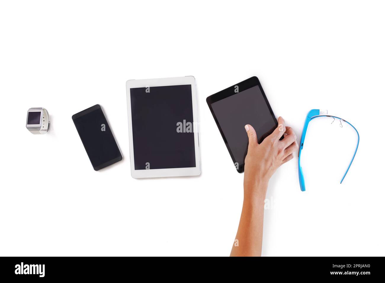 Tools of the trade. a hand holding a mobile phone as part of a ...