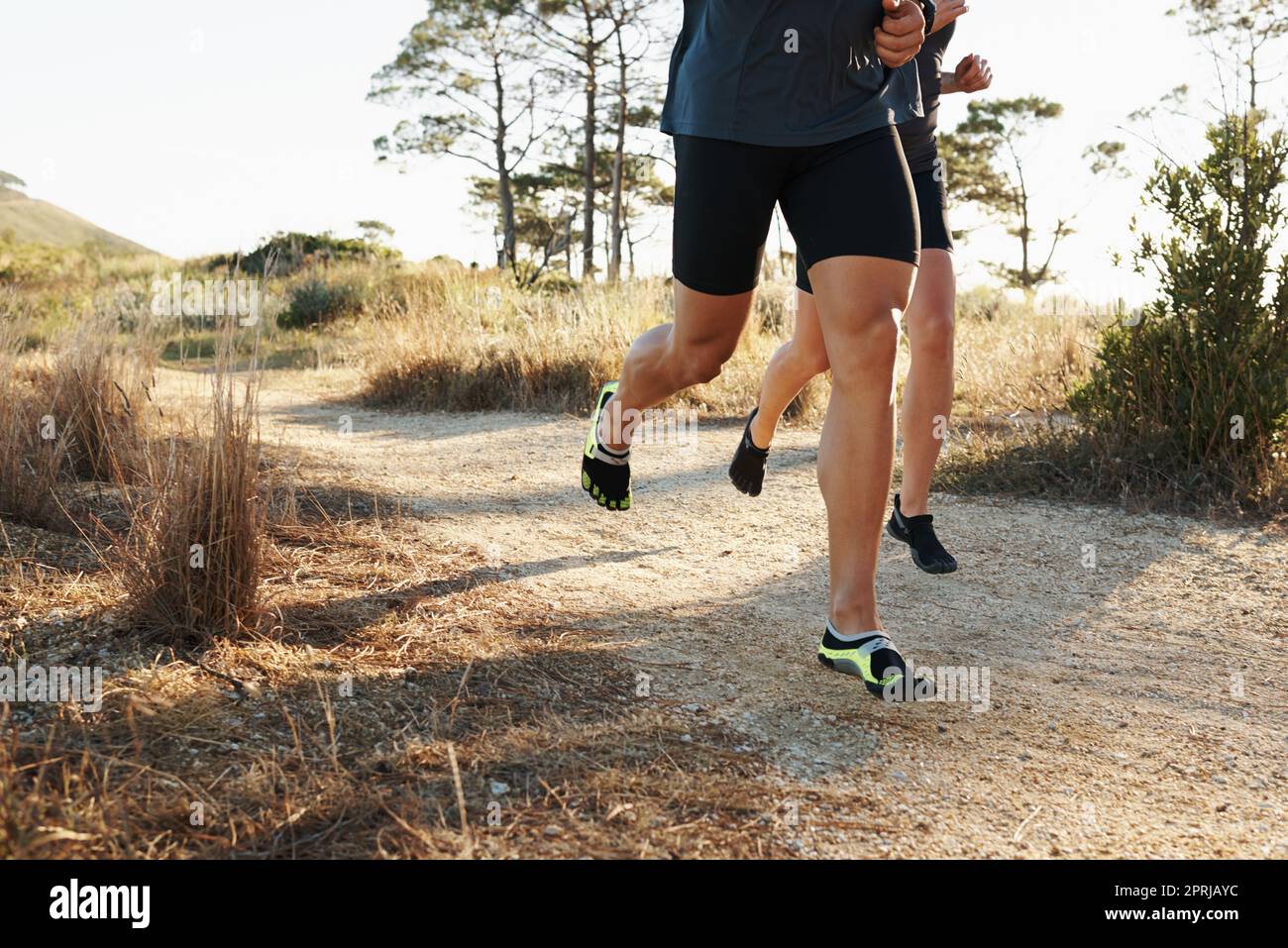 Feeling good and keeping fit. A young athlete running outdoors Stock ...
