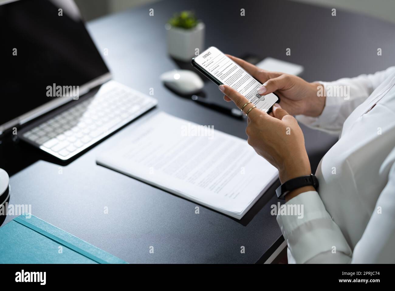 Taking picture with phone laptop hi-res stock photography and images ...