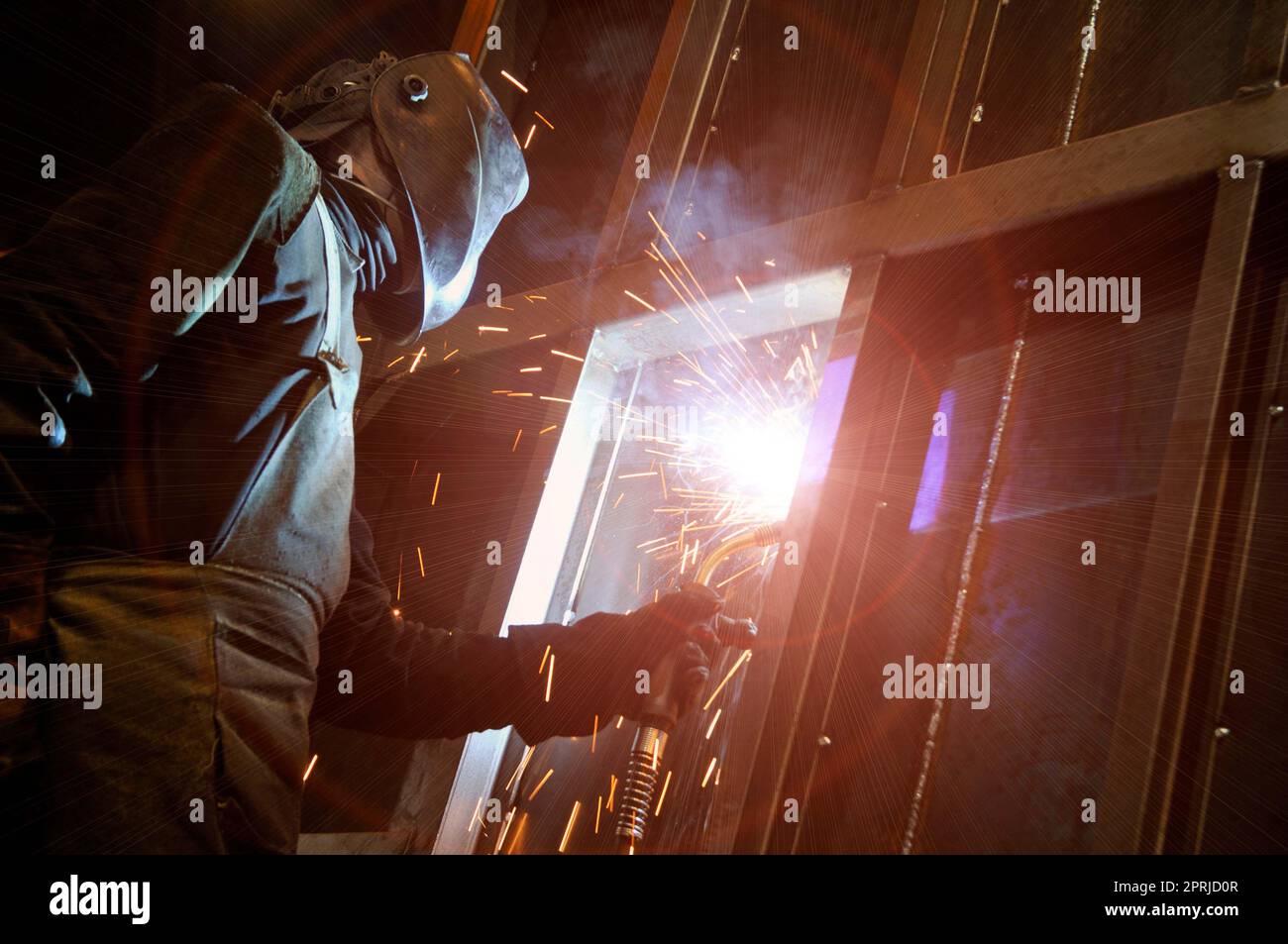 The process of welding a vertical joint in a product. Production Stock ...