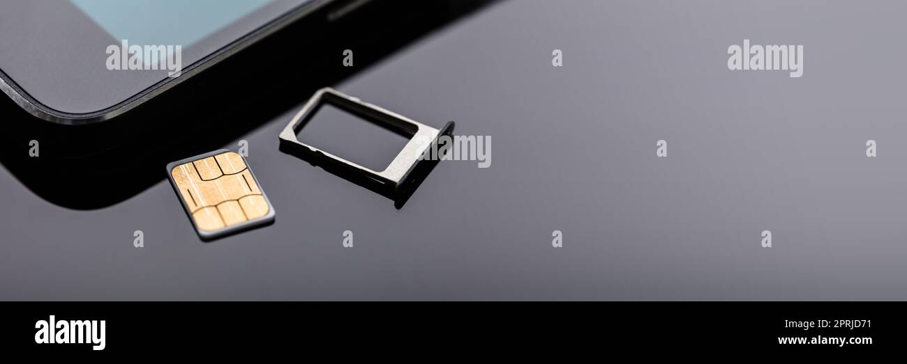 Sim Card Inserting In Smart Phone. Mobile Simcard Stock Photo - Alamy