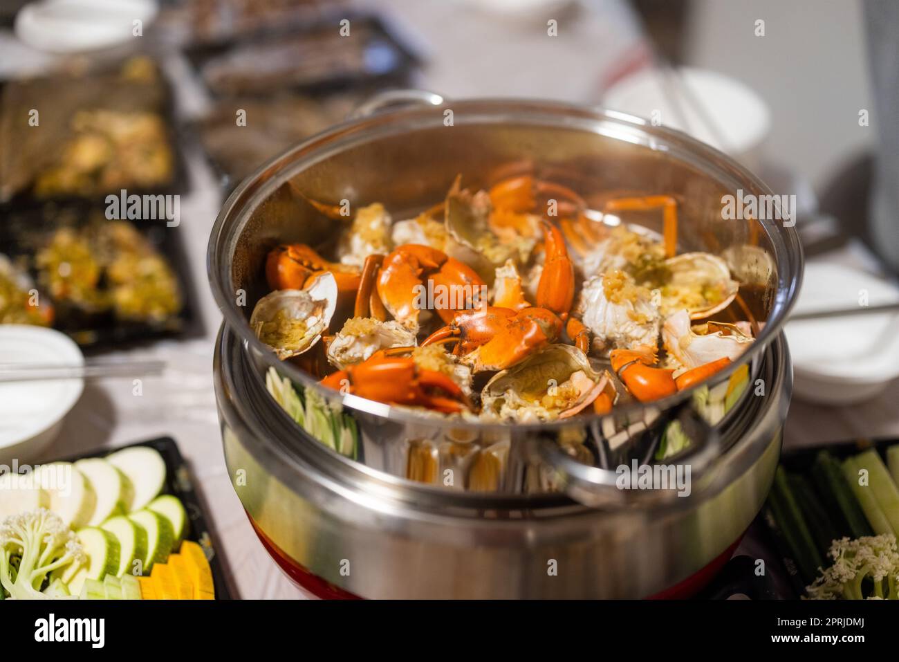 Steamed seafood in the pot at home Stock Photo - Alamy