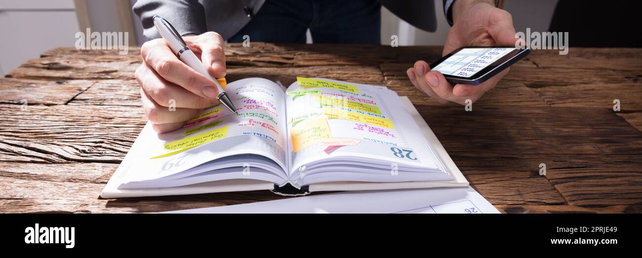Business Plan Work Schedule And Phone Planning Stock Photo - Alamy