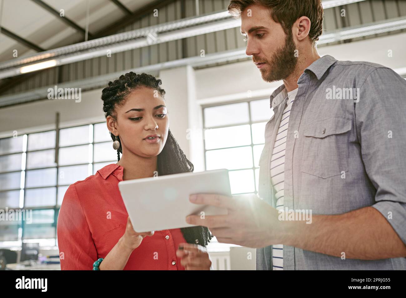 Two is better than one in a brainstorming session. two colleagues using ...