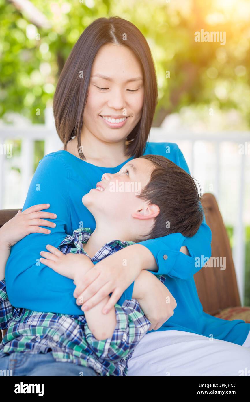 Outdoor Portrait of Chinese Mother with Her Mixed Race Chinese and ...