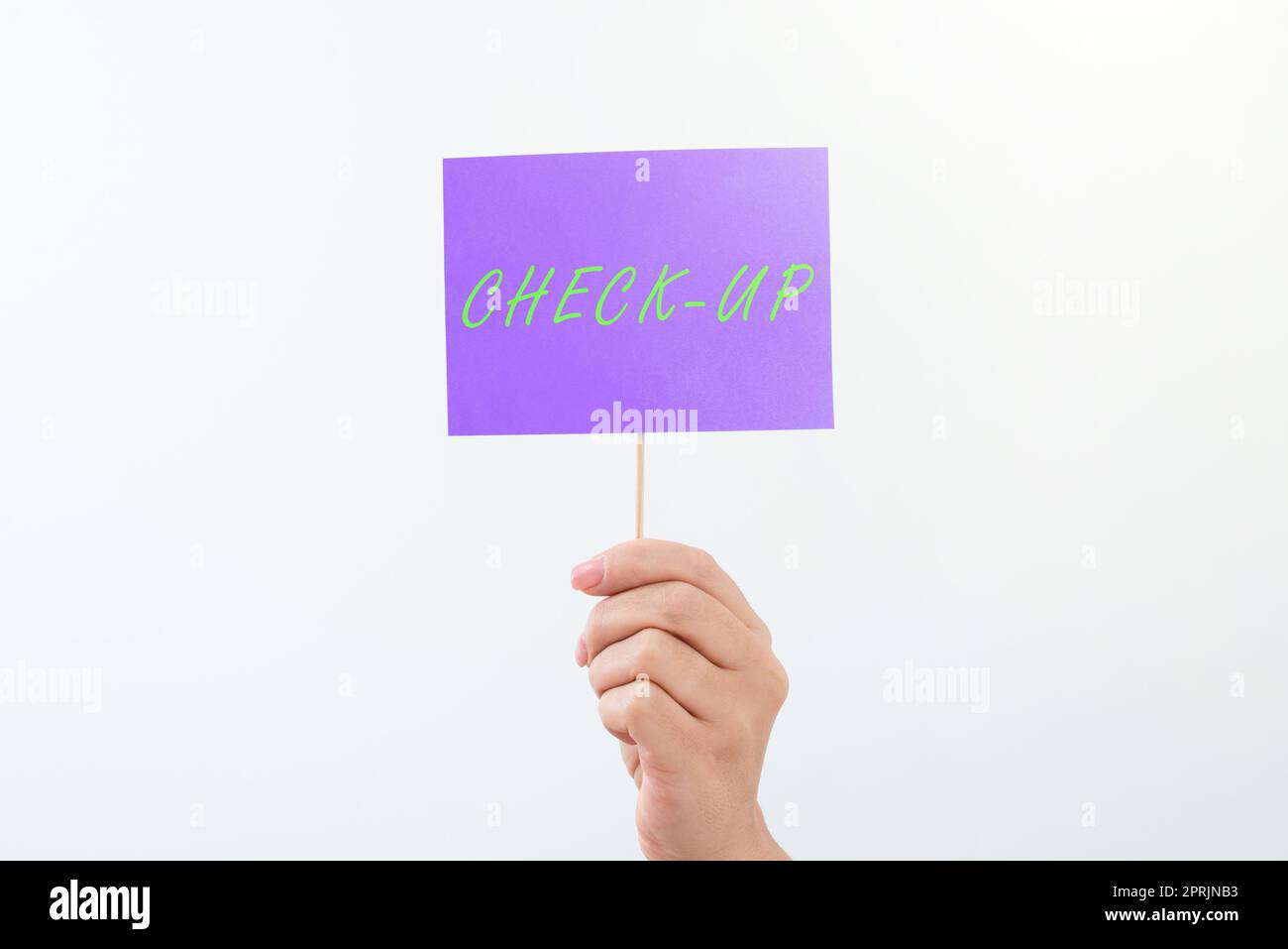 Hand writing sign Check Up, Word Written on physical medical or ...