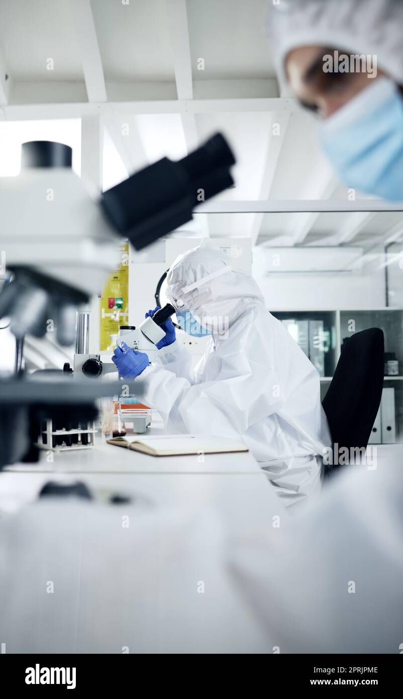 Science, laboratory and scientist doing covid research on dna, rna and ...