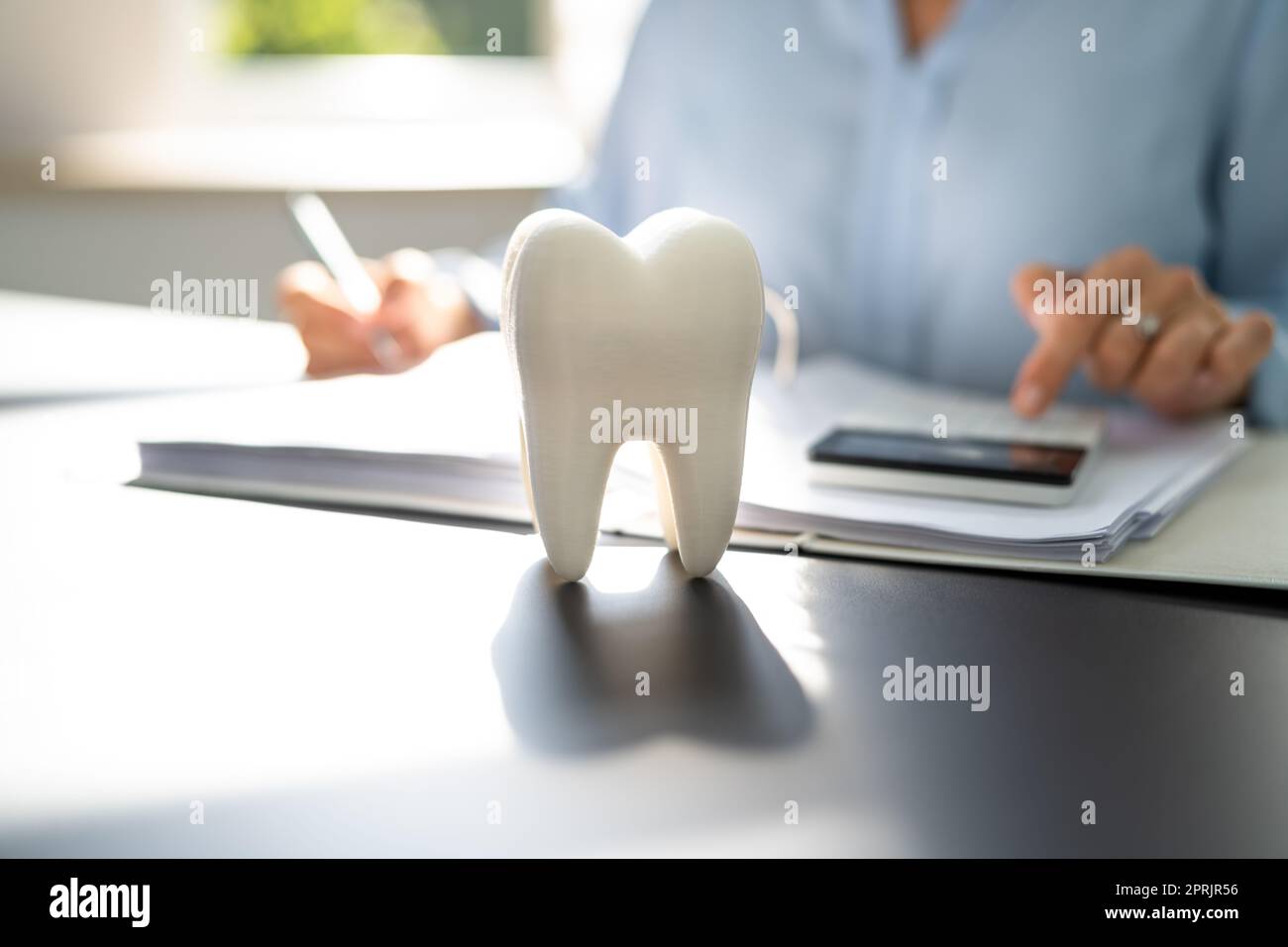Dental Insurance Money. Dentist Service Desk Stock Photo - Alamy