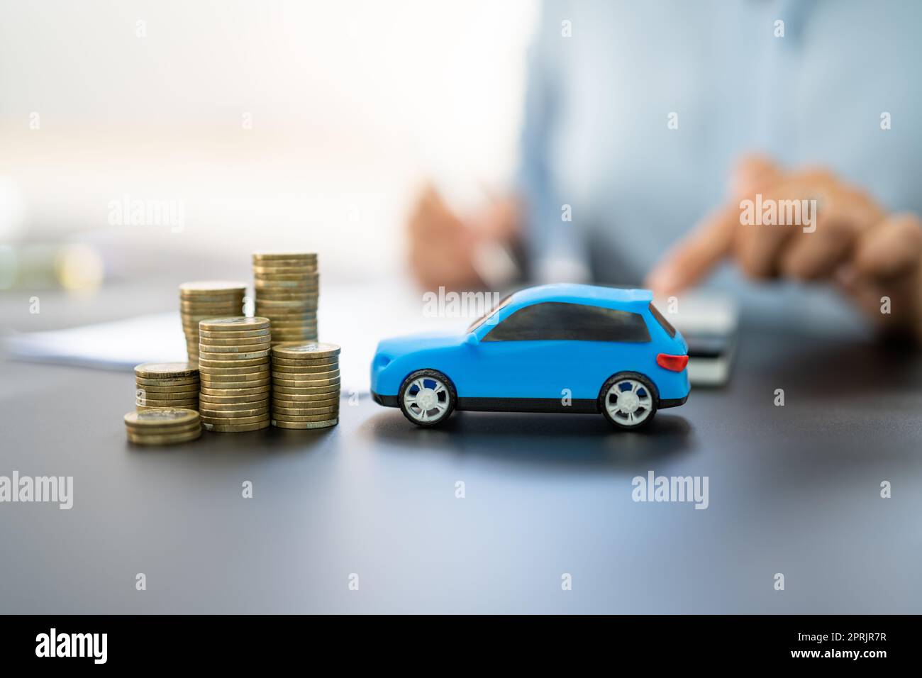 Blue Toy Car In Front Stock Photo - Alamy