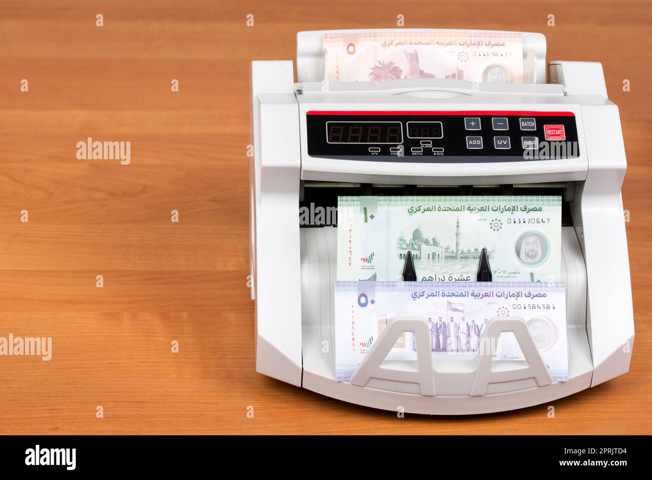Money from the United Arab Emirates - Dirham in the counting machine ...