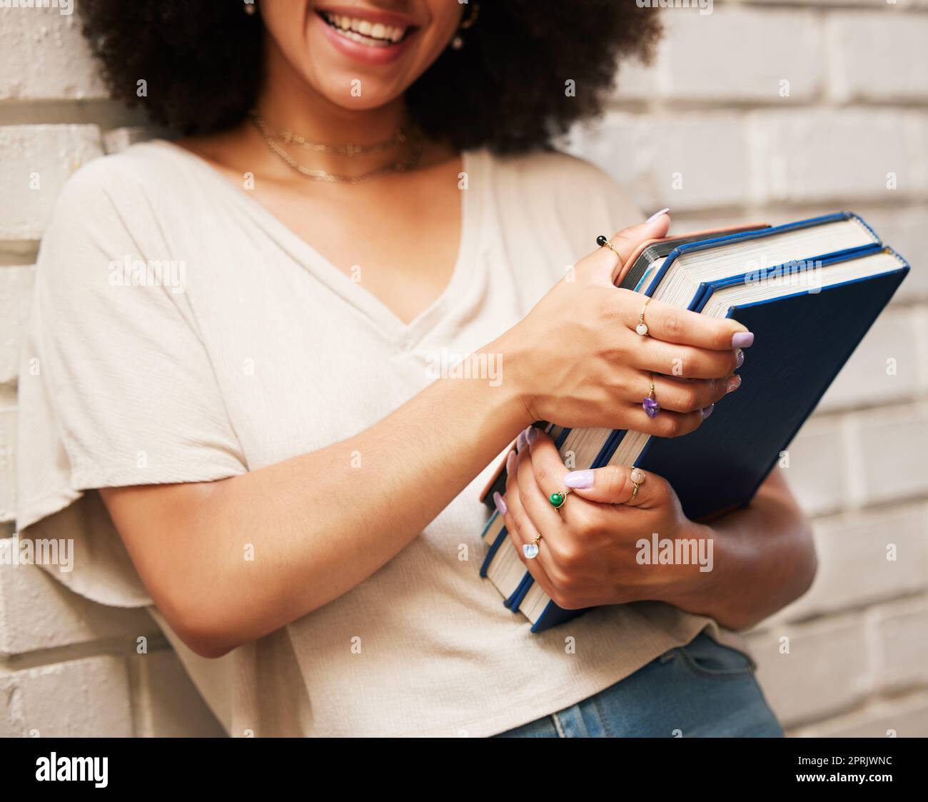 African teen girl studying book hi-res stock photography and images - Alamy