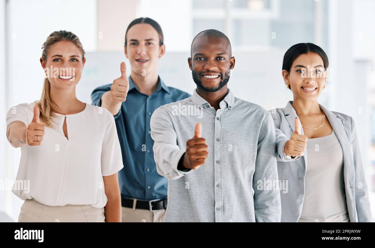 Thumbs up, motivation and support team with diversity business people in collaboration for ...