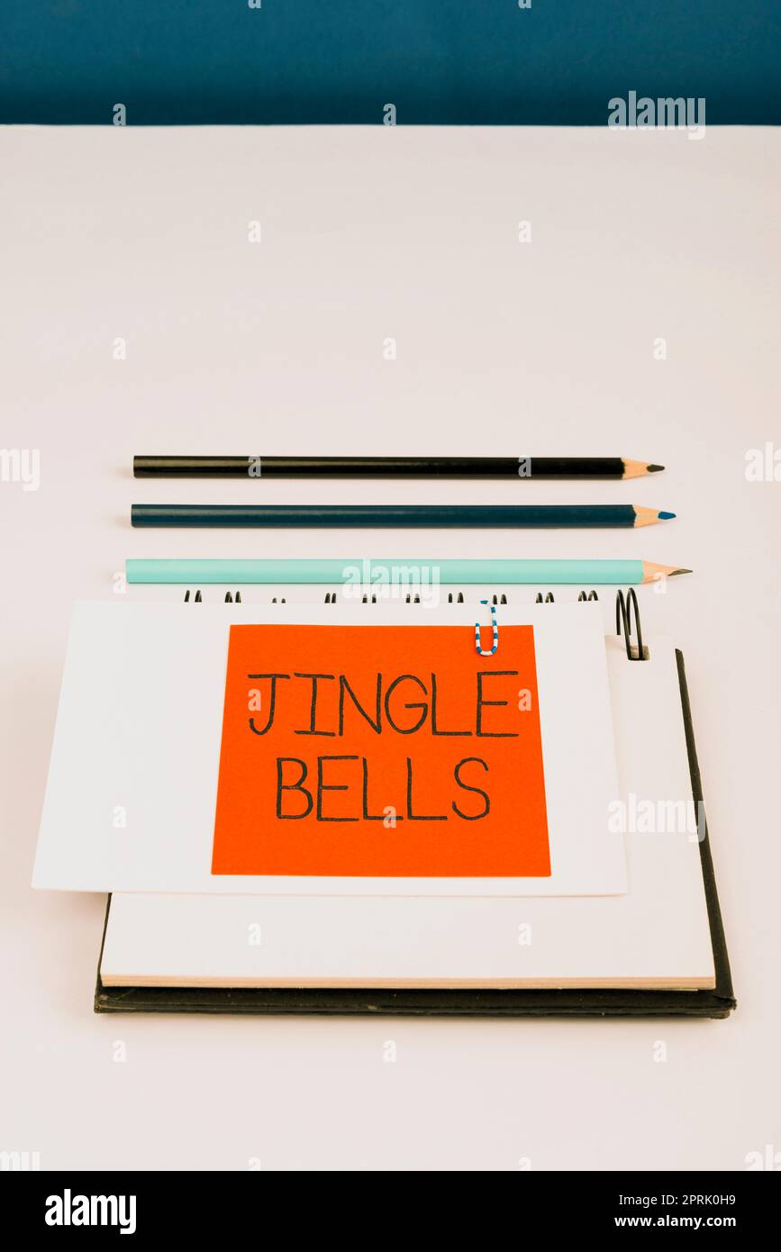 Hand writing sign Jingle Bells, Concept meaning Most famous traditional ...