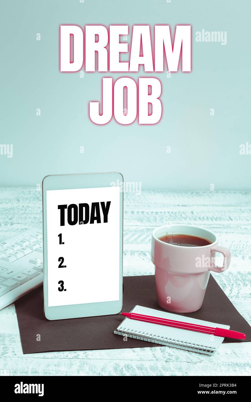 Conceptual caption Dream Job, Word Written on An act that is paid of by ...