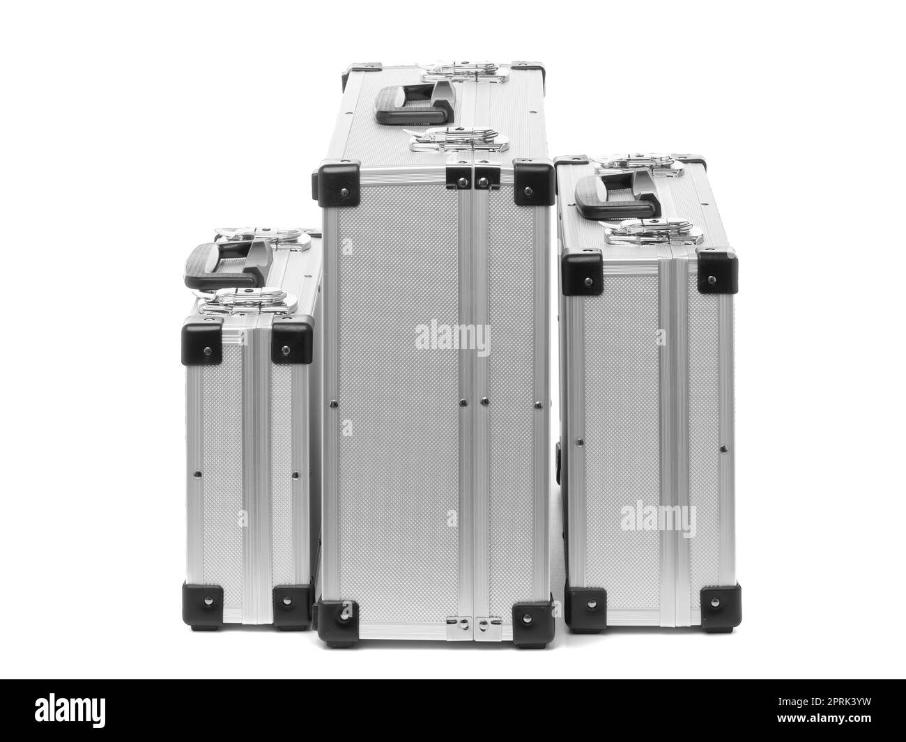 Set of metal suitcases of different sizes isolated on white background ...