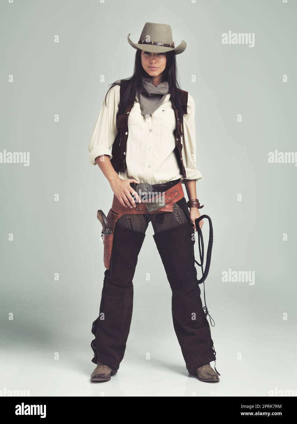 Im the sheriff around these parts...Full-length shot of an attractive ...