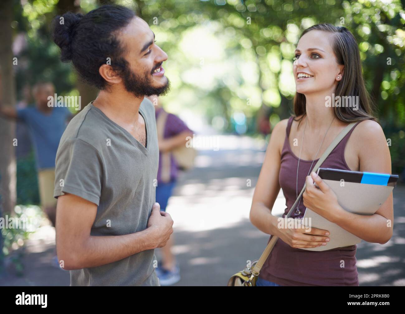 A day with a friend is always well-spent. a male and female student on ...