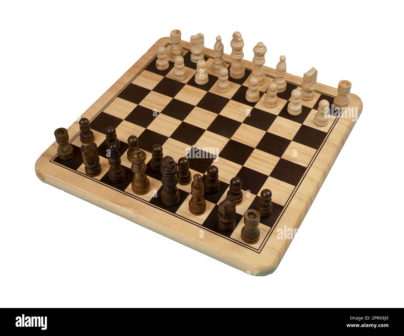 the chess pieces arranged on a chessboard on a transparent surface ...