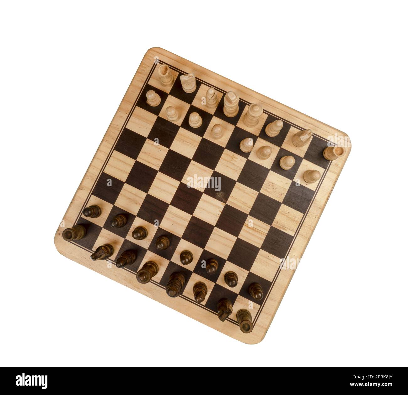 the chess pieces arranged on a chessboard on a transparent surface ...