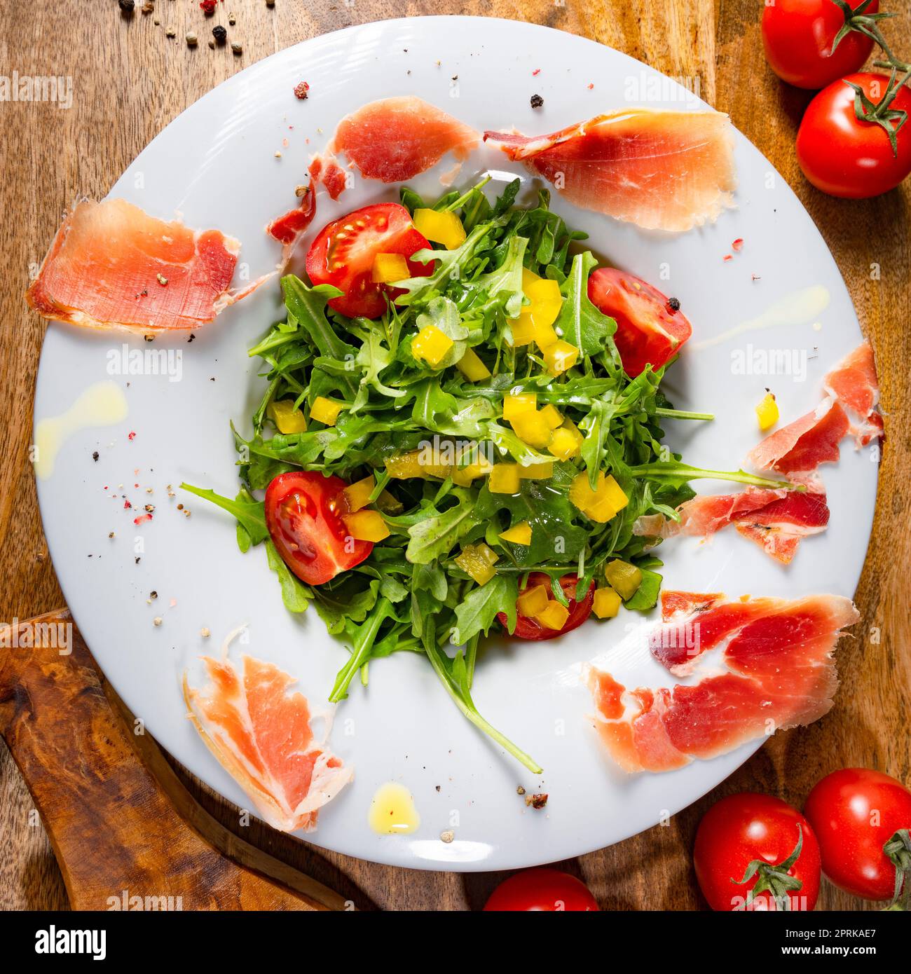 Rocket salad with dried Spanish ham Stock Photo - Alamy