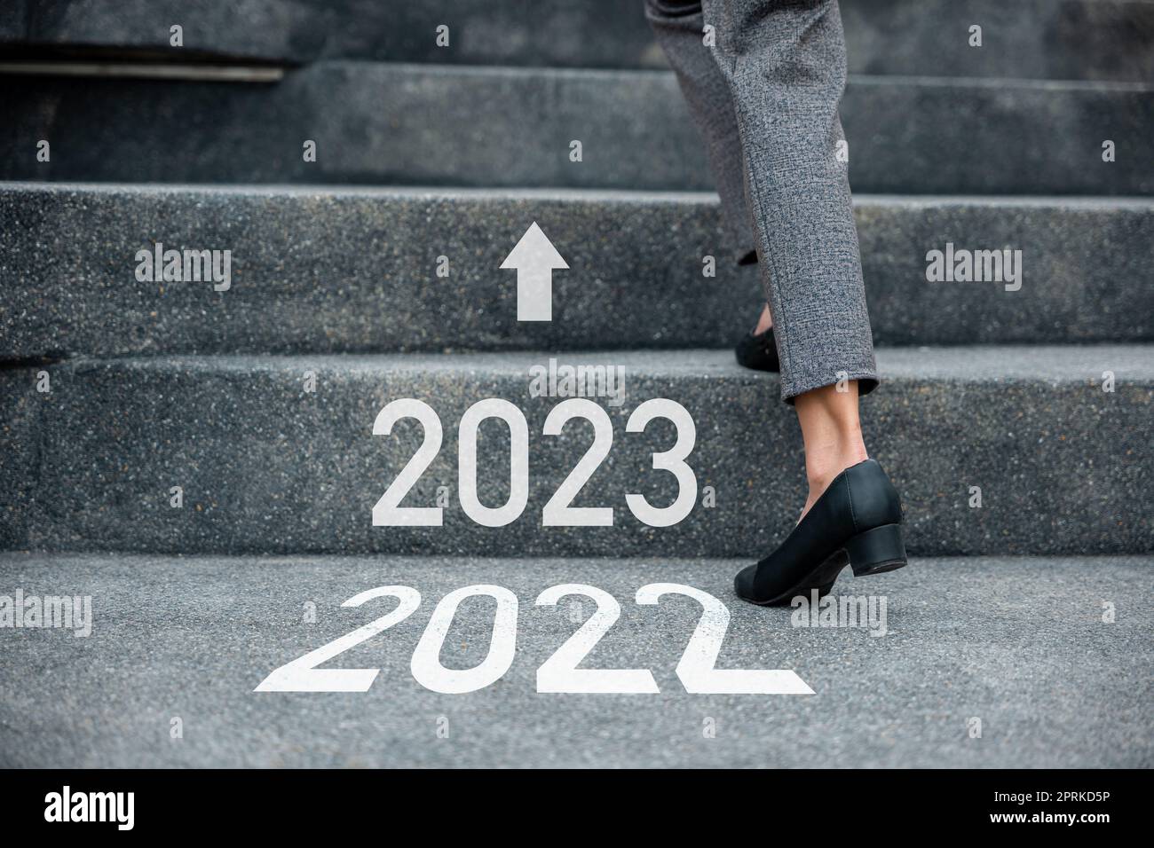 Happy new year 2023. Stepping going up stairs in city, Closeup legs of ...