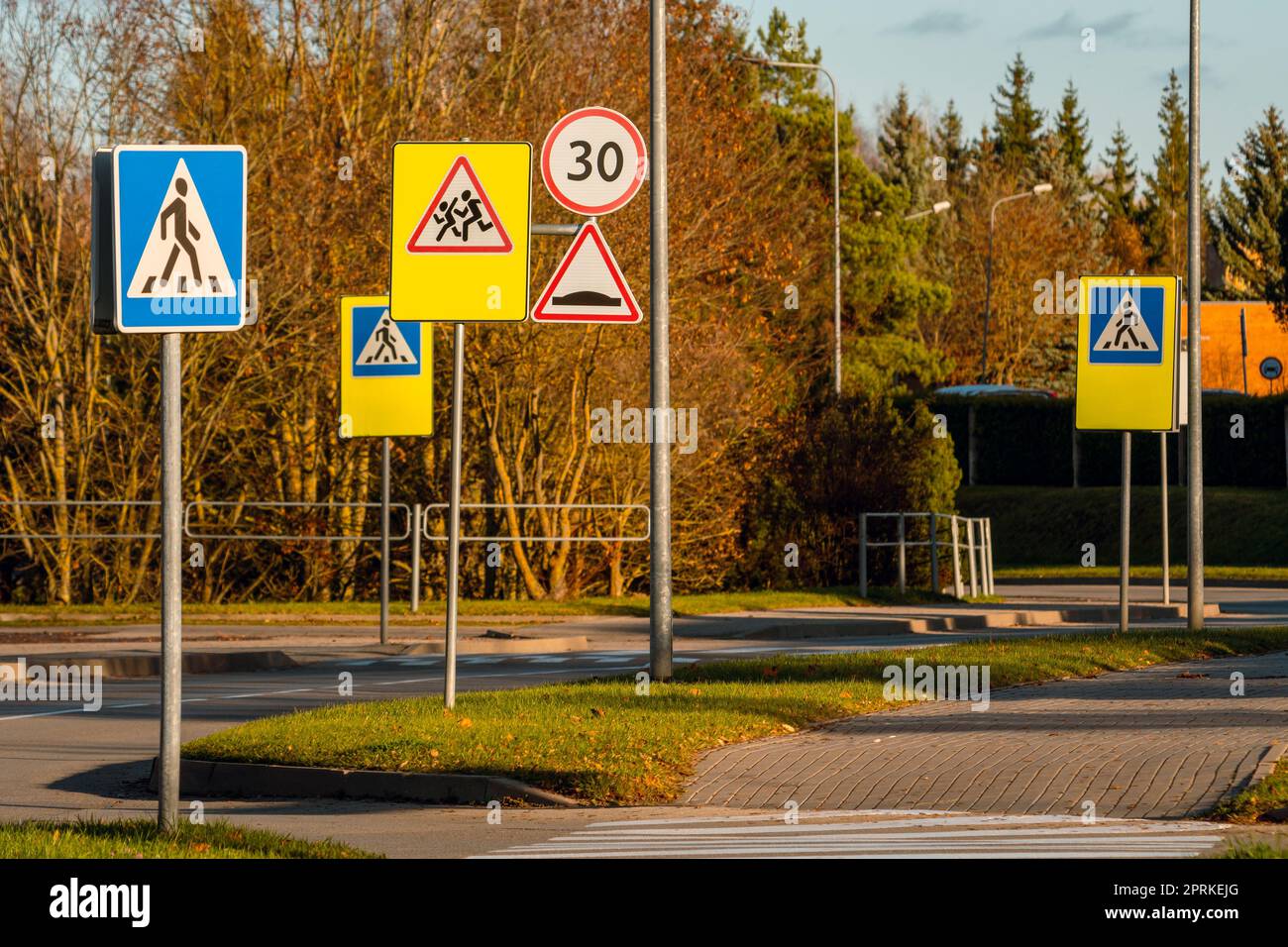 A lot of road signs. Various road signs at the city street in autumn ...