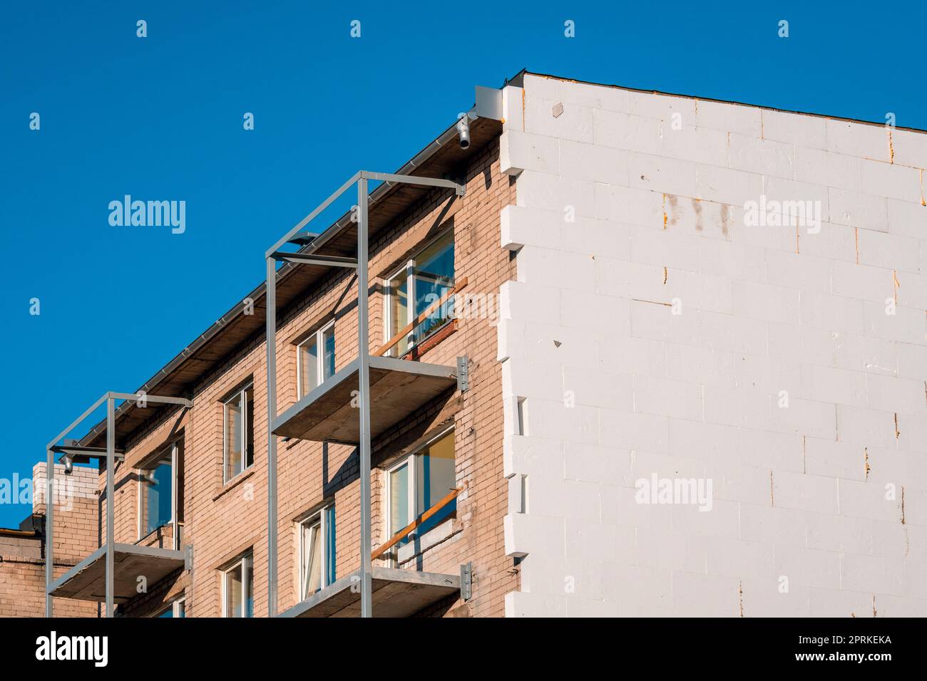 External wall insulation, corner of multistory. Wall insulation with ...