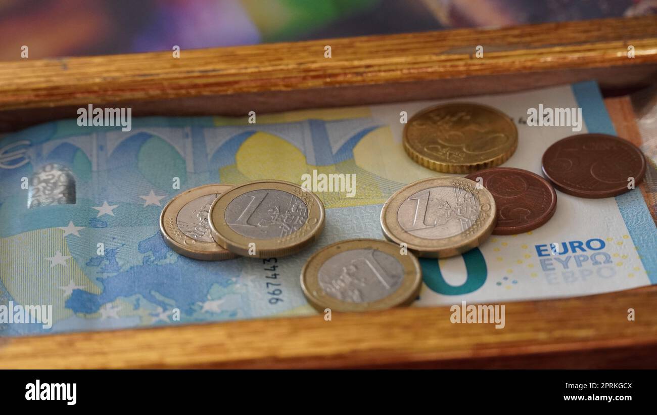 Bills and coins of European Union currency Stock Photo - Alamy