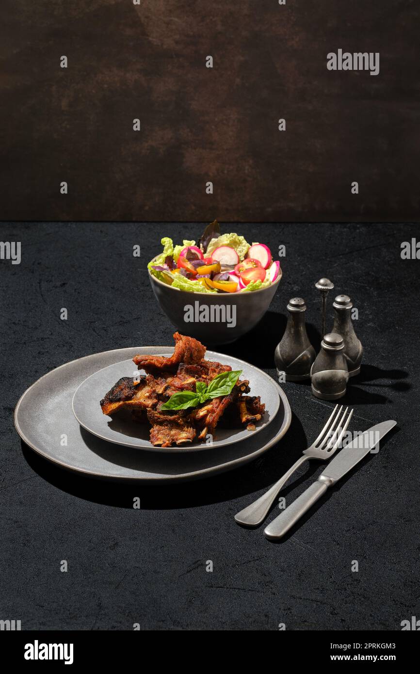 Marinated lamb ribs baked in oven Stock Photo - Alamy