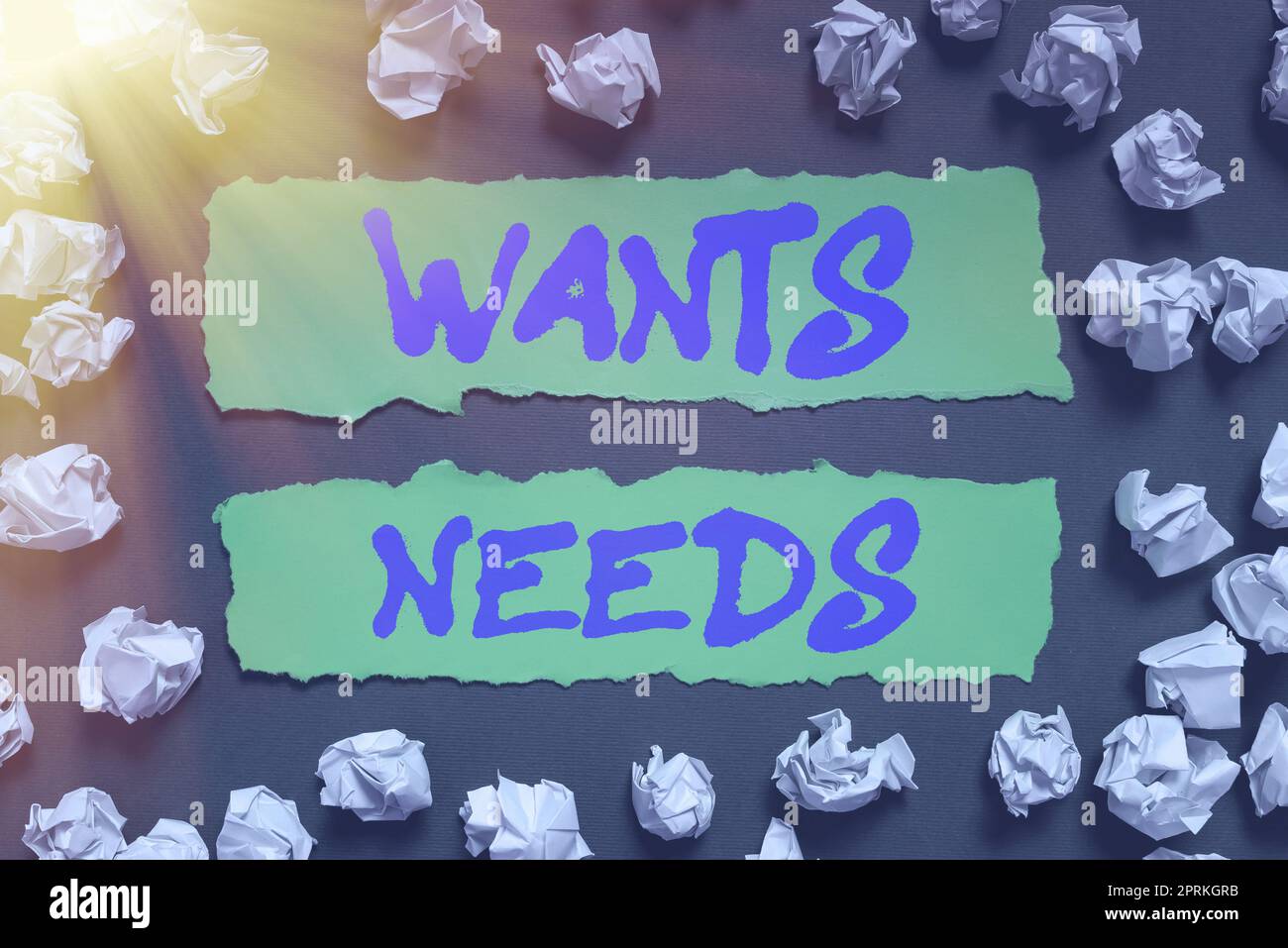 Text caption presenting Wants Needs, Conceptual photo to have something ...