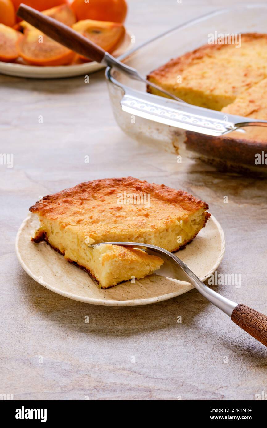 Persimmon on plate fork hi-res stock photography and images - Alamy